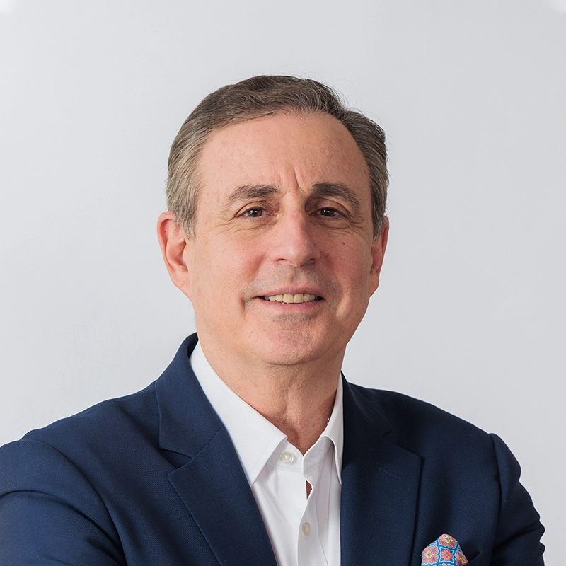 Mr. John Defterios